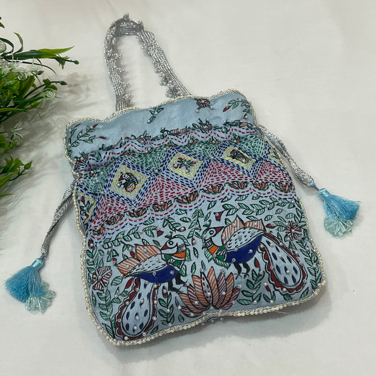 Hand-Painted BLUE Potli with Madhubani and Sujni Hand Embroidery – Mridani